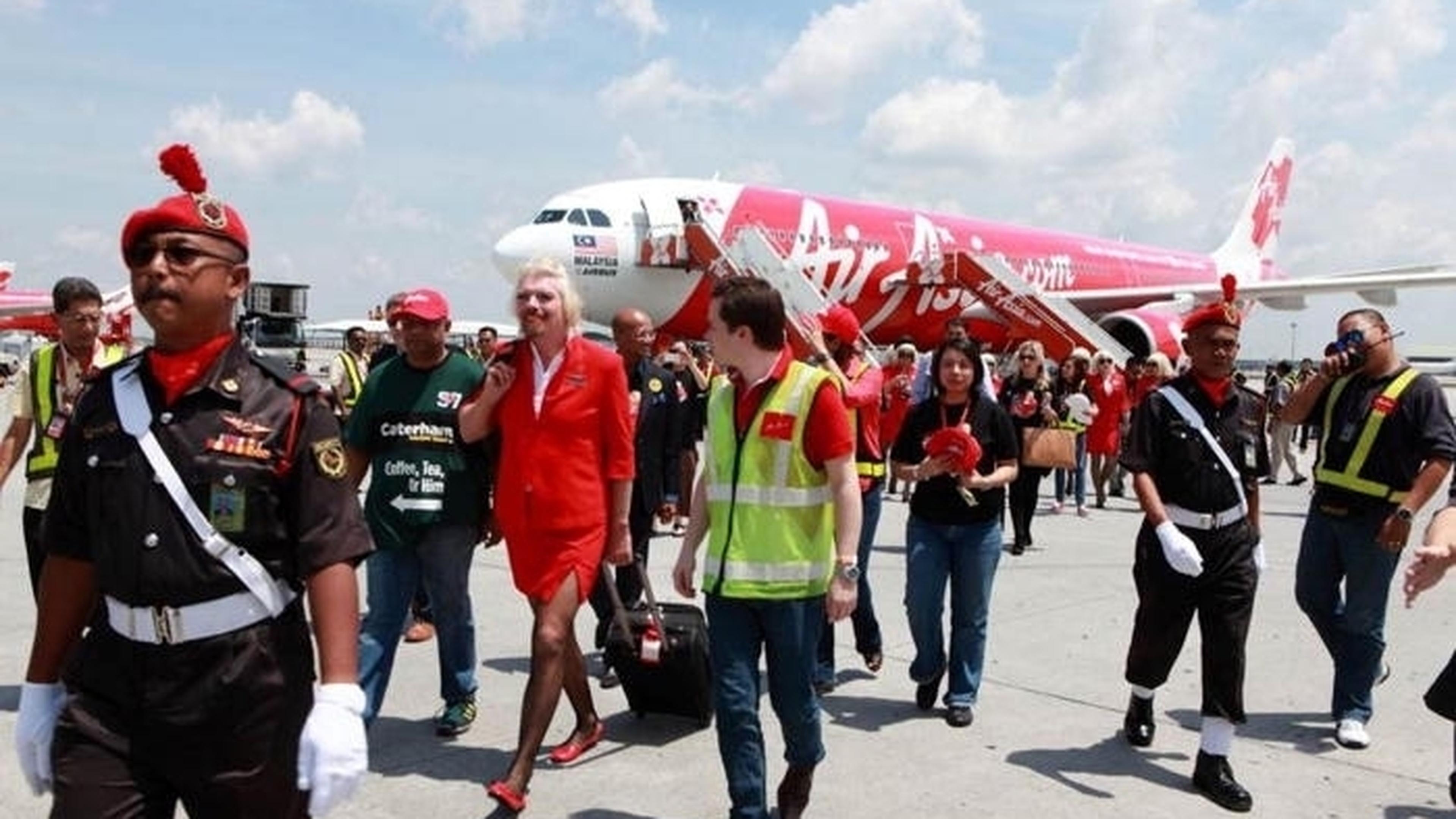 Richard Branson Serves As Airasia Stewardess After Losing Bet
